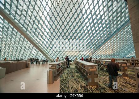 Interior view of Seattle Central Library with sloped glass roof ...
