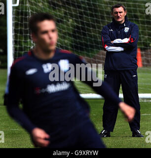 West Bromwich Albion manager Tony Mowbray greets mascot Baggie Bird ...