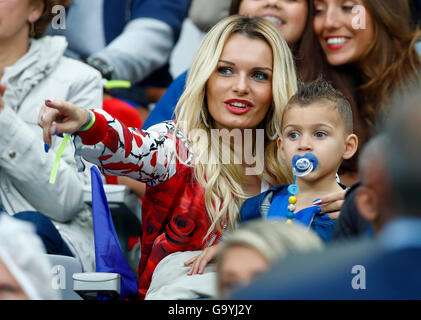 Ludivine Payet, wife of Dimitri Payet, with her son Milan Payet Stock ...