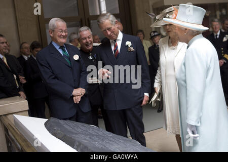 The Duke and Duchess of Edinburgh unveil a plaque during a visit to ...