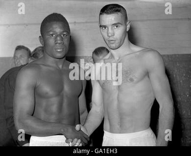 Boswell St Louis of Trinidad (left) shaking hands with Freddie Tiedt of ...