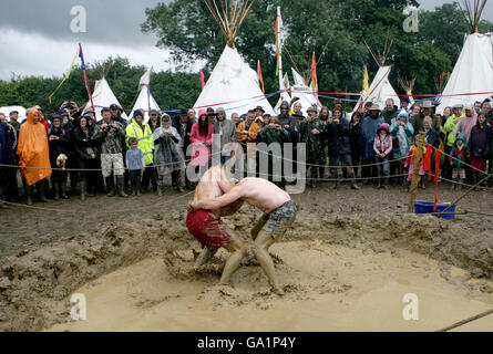 Two men mud wrestling at a mud fighting competition at The LowLand ...