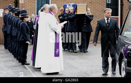 The coffin of murdered Policeman Pc Jon Henry leaves Holy Ghost ...