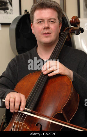 Cellist Paul Watkins practices at home with an 18th century ...