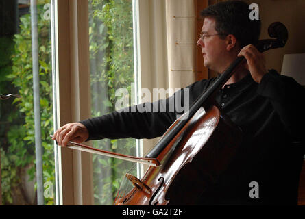 Cellist Paul Watkins practices at home with an 18th century ...