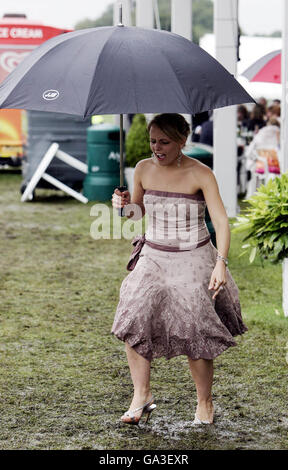 A racegoer on day four of Royal Ascot at Ascot Racecourse, Berkshire ...