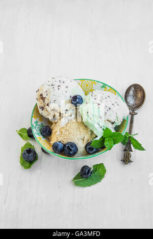 Vanilla cream with blueberries and mint Stock Photo - Alamy