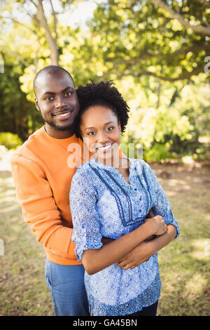 Happy couple posing together Stock Photo - Alamy