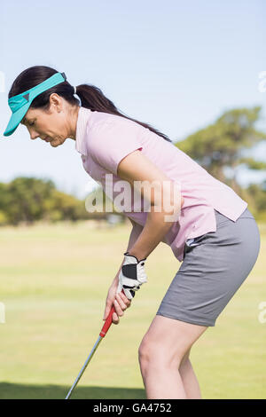 woman playing golf Stock Photo - Alamy