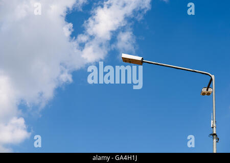 Light poles. Street lamp against blue sky background Stock Photo - Alamy