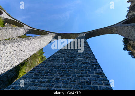 Filisur bridge Landwasserviadukt of the Albulabahn over stream ...