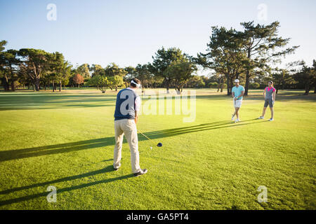 people playing golf Stock Photo - Alamy