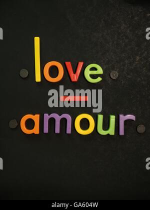 Love, Amour! Inspirational message in vibrant colorful magnet letters ...