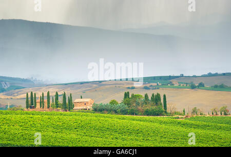 Tuscany landscape in rainy weather with dramatic cloudy sky. Val d ...