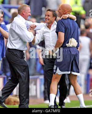l-r; Leeds United's Manager Dennis Wise celebrates victory with David ...
