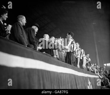 Prime Minister Winston Churchill presents the FA Cup to Newcastle ...