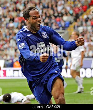Everton's Joleon Lescott celebrates after scoring the opening goal of ...