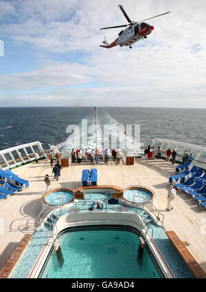 QE2 Pool Deck with Passengers Stock Photo - Alamy