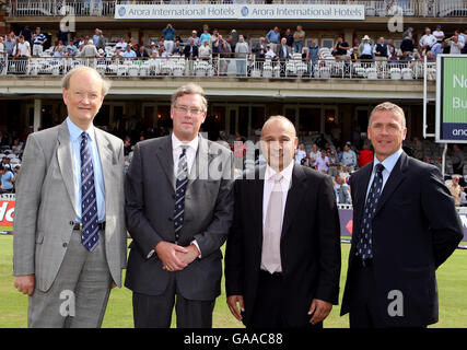 Former England and Surrey cricketer Alec Stewart stands with his wife ...