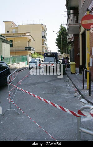 Fallen rubble from a building cornices in Arzano. Falling rubble from a ...
