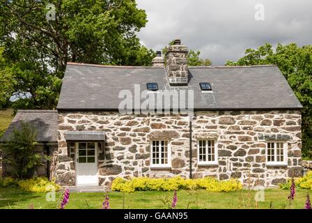 Traditional stone cottage with Welsh slate roof at Llanfihangel-Y ...