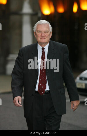 Coroner Lord Justice Scott Baker (centre) pictured with unidentified ...