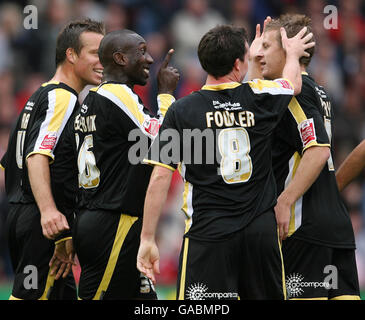 Cardiff City's Jimmy Floyd Hasselbaink and Kevin McNaughton celebrate ...