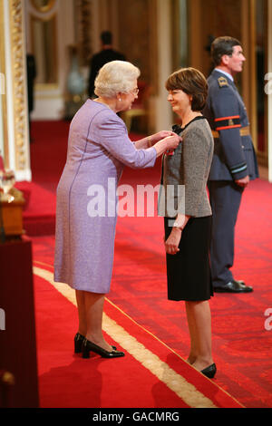 Kay Carberry, from London, is made a CBE by The Queen at Buckingham ...
