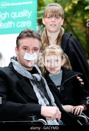 Russell Watson leaves the Alexandra Hospital Cheadle with his daughters ...