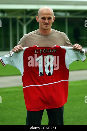 Football - Pascal Cygan signs to Arsenal.. Pascal Cygan holds his new ...