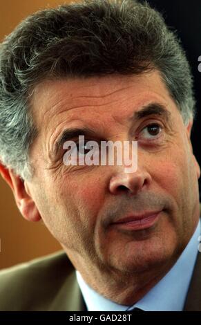 Football - Pascal Cygan signs to Arsenal.. Pascal Cygan holds his new ...