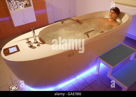 Man taking CO2 bath, balneology Stock Photo - Alamy