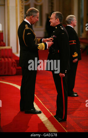 Captain Colin Smith is made an MBE by The Prince of Wales at Buckingham ...