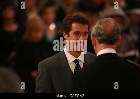 Mr. Roger Stringer is made an MBE by The Prince of Wales at Buckingham ...