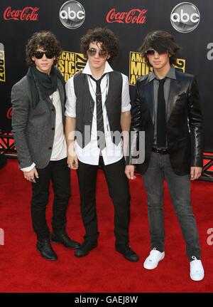 The Jonas Brothers arrive at the American Music Awards in Los Angeles ...