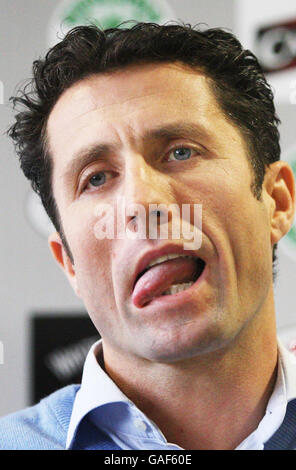 Hibernian boss John Collins talking at a press conference at the Easter ...