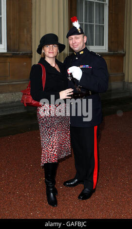 Captain Colin Baines with wife Claire Baines as he receives his MBE ...