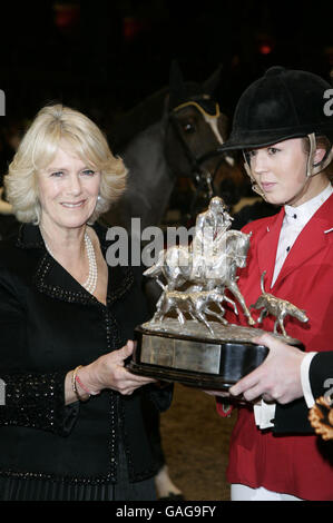 The Duchess of Cornwall (left) presents the Raymond Brooks-Ward trophy ...