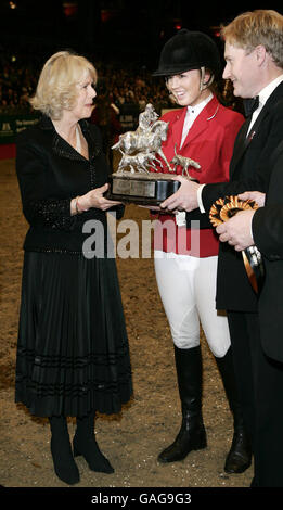 The Duchess of Cornwall (left) presents the Raymond Brooks-Ward trophy ...
