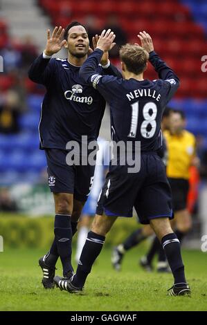 Everton's Joleon Lescott celebrates after scoring the opening goal of ...