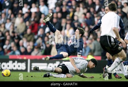 (L-R) Tottenham Hotspur's Robbie Keane, Dean Richards and goalscorer ...