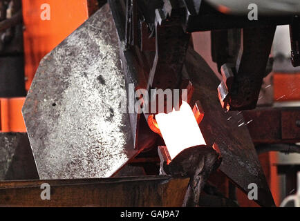positioning unit and supplying the heated round billet Stock Photo - Alamy
