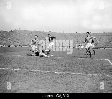 With Rest of Europe goalkeeper Julien Darui (l) stranded, Great Britain ...