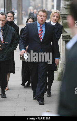 Compulsive gambler Graham Calvert (centre) arrives at the High Court in ...