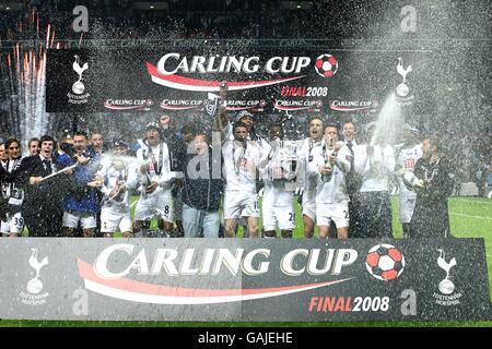 Players of Tottenham celebrate with the trophy after winning the UEFA ...