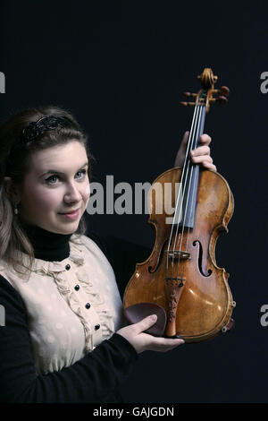 Violinist Chloe Hanslip holds a Guarneri del Gesu violin was once owned ...