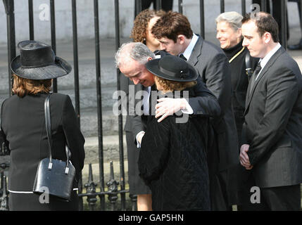 Maeve Hillery (on right) is comforted by her son John at The state ...