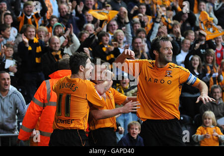Hull City's Nick Barmby (centre) celebrates with his team mates after ...