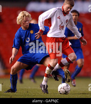 Manchester United's Mads Timm and Charlton Athletic's Osei Sankofa ...