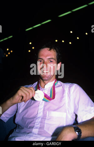 Ian Stark of Great Britain with his silver medal that he won along with ...